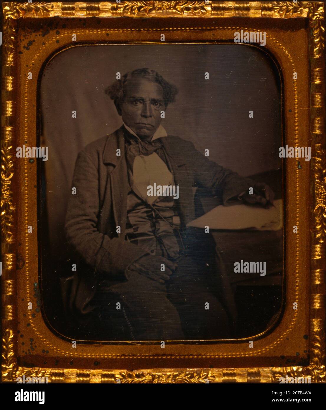 Edward Morris, three-quarter length portrait, full face, seated at desk ...