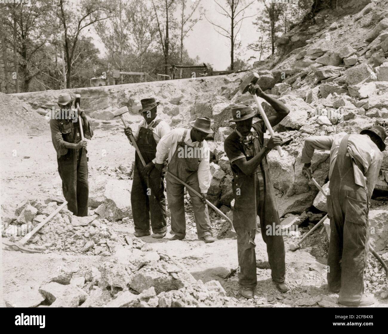 Prisoners breaking rocks hi-res stock photography and images - Alamy