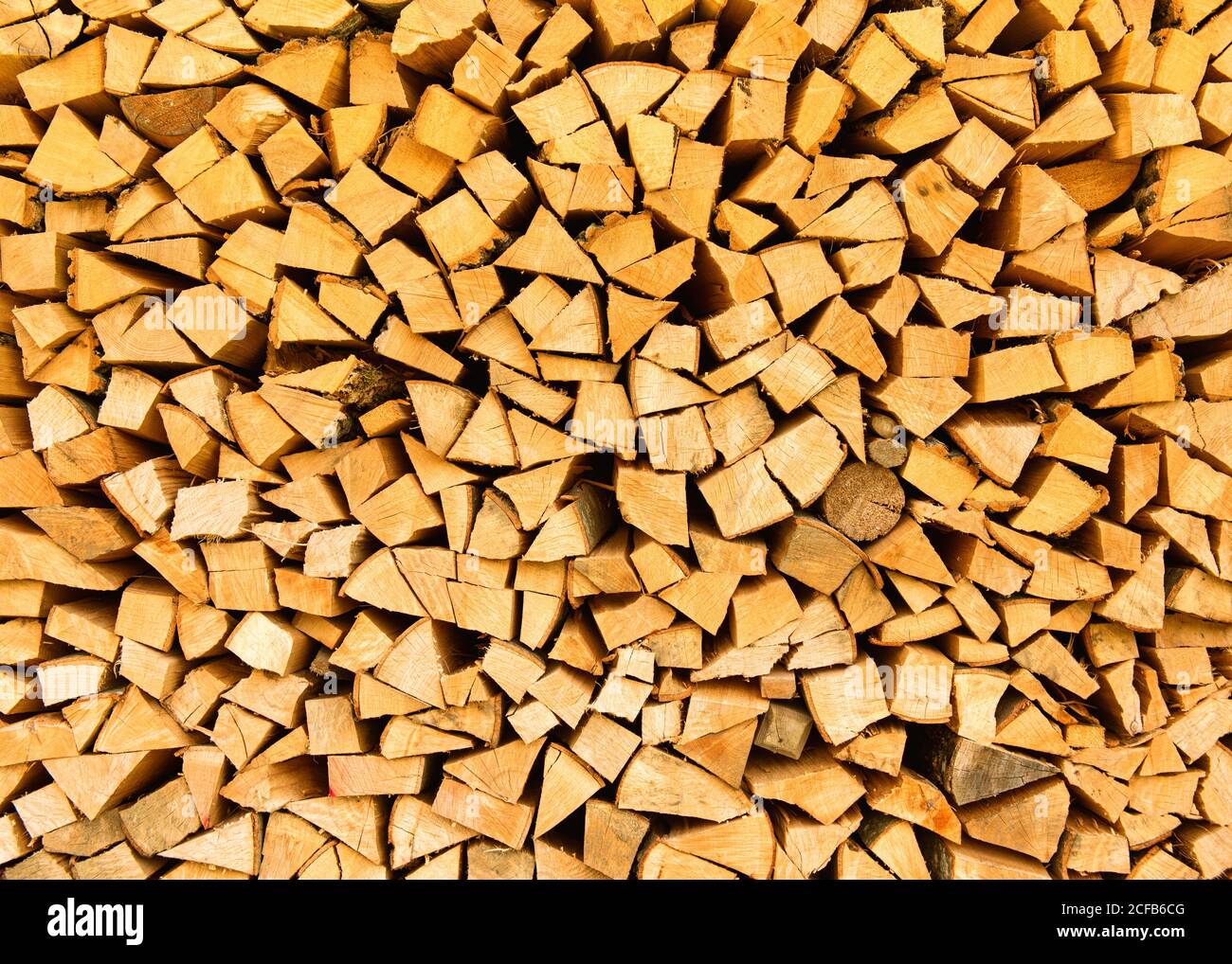 Stack of firewood pattern. Natural background Stock Photo - Alamy