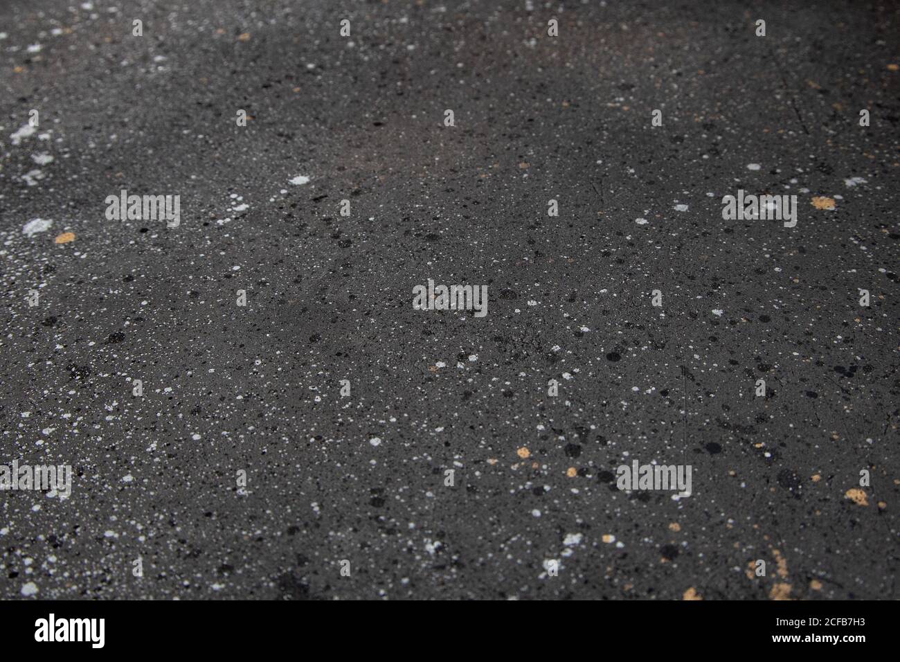 Black textured wall paint spatter gold, silver Stock Photo - Alamy