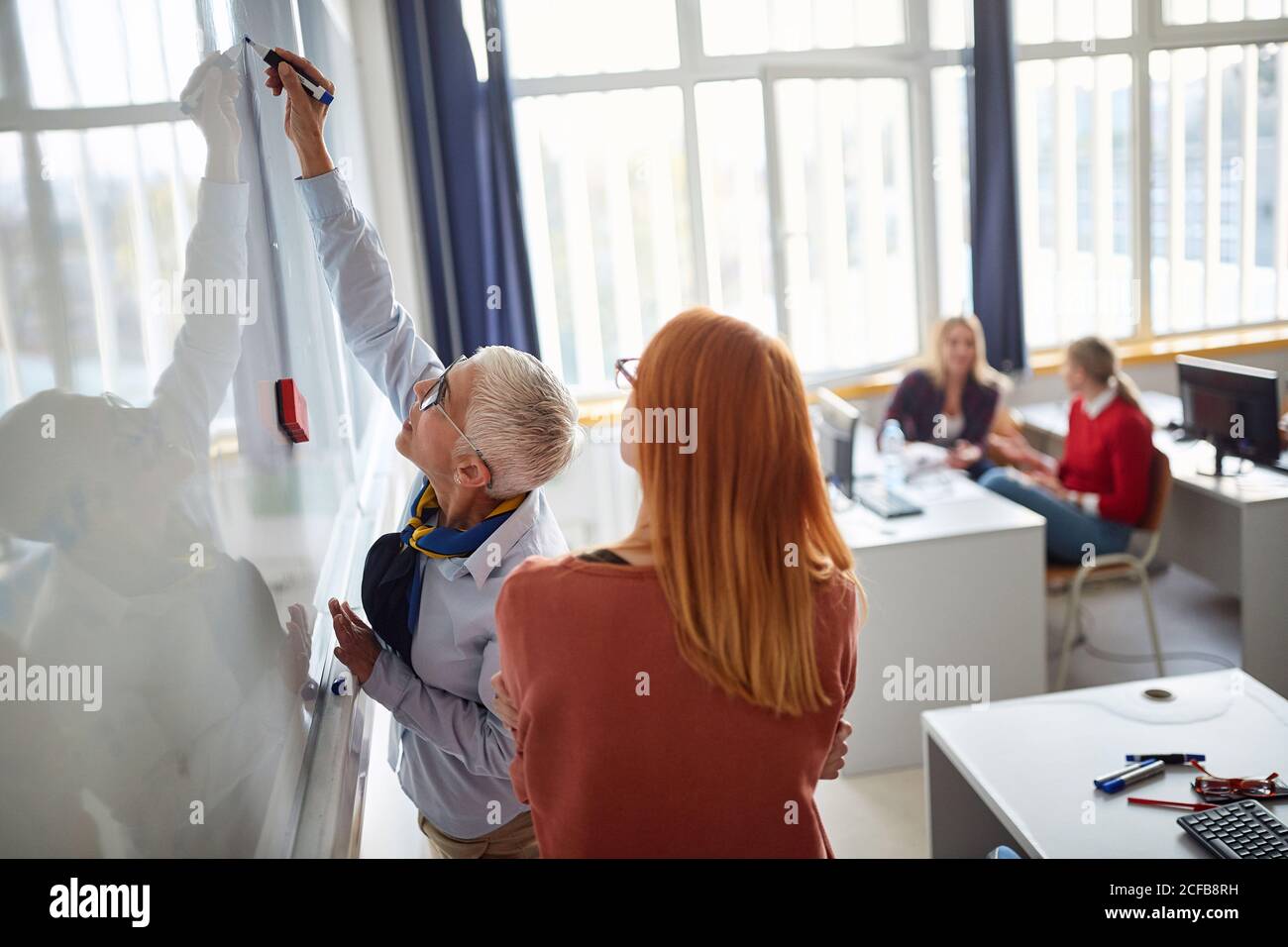 College classroom board teacher hi-res stock photography and images - Alamy