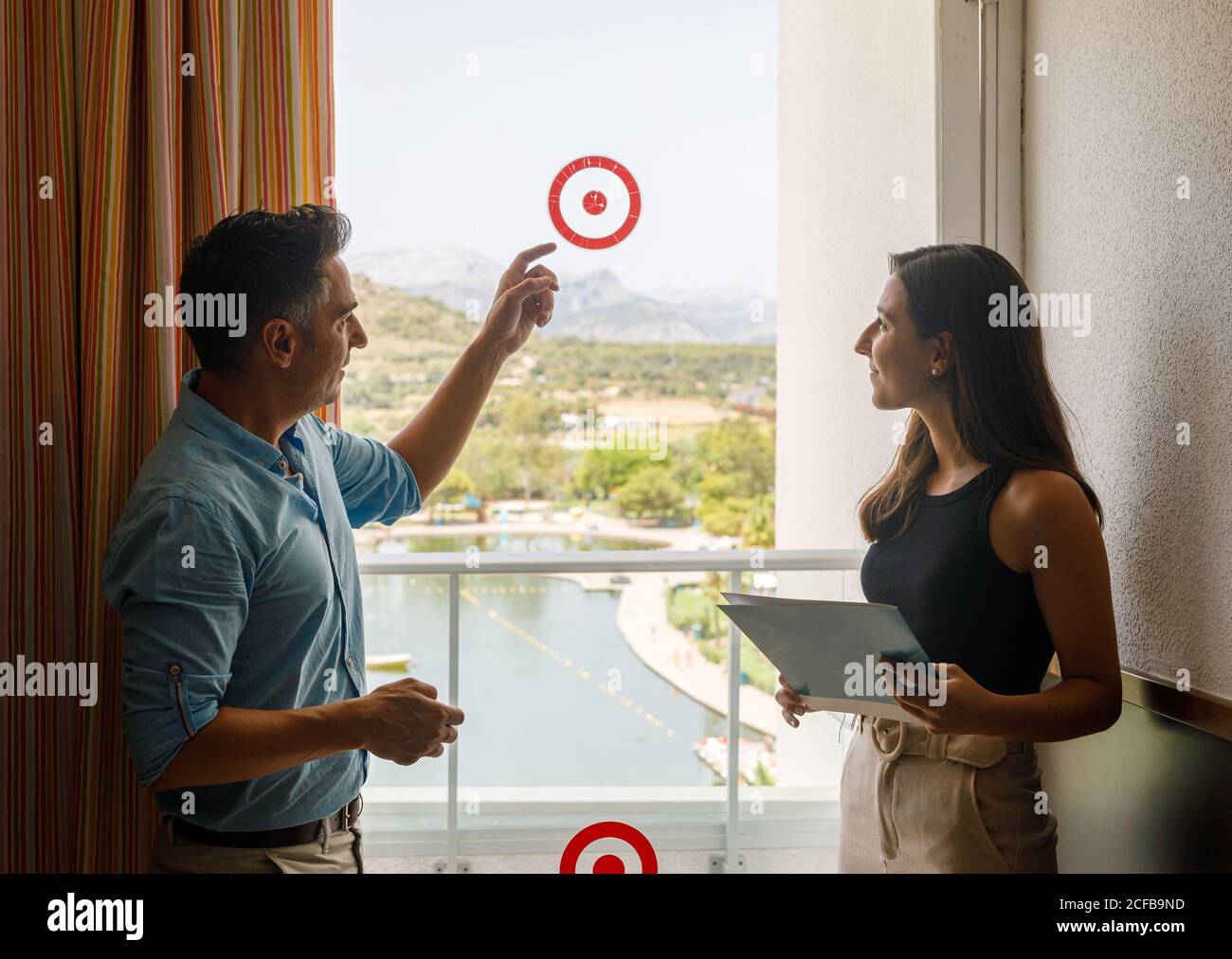 Safety inspectors checking stickers on hotel window Stock Photo - Alamy