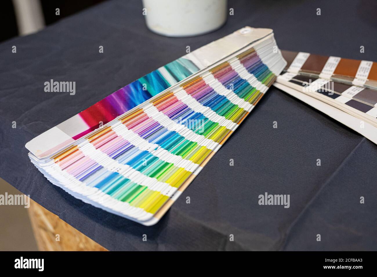 Colorful papers with different sets of color spectrum on table in ...