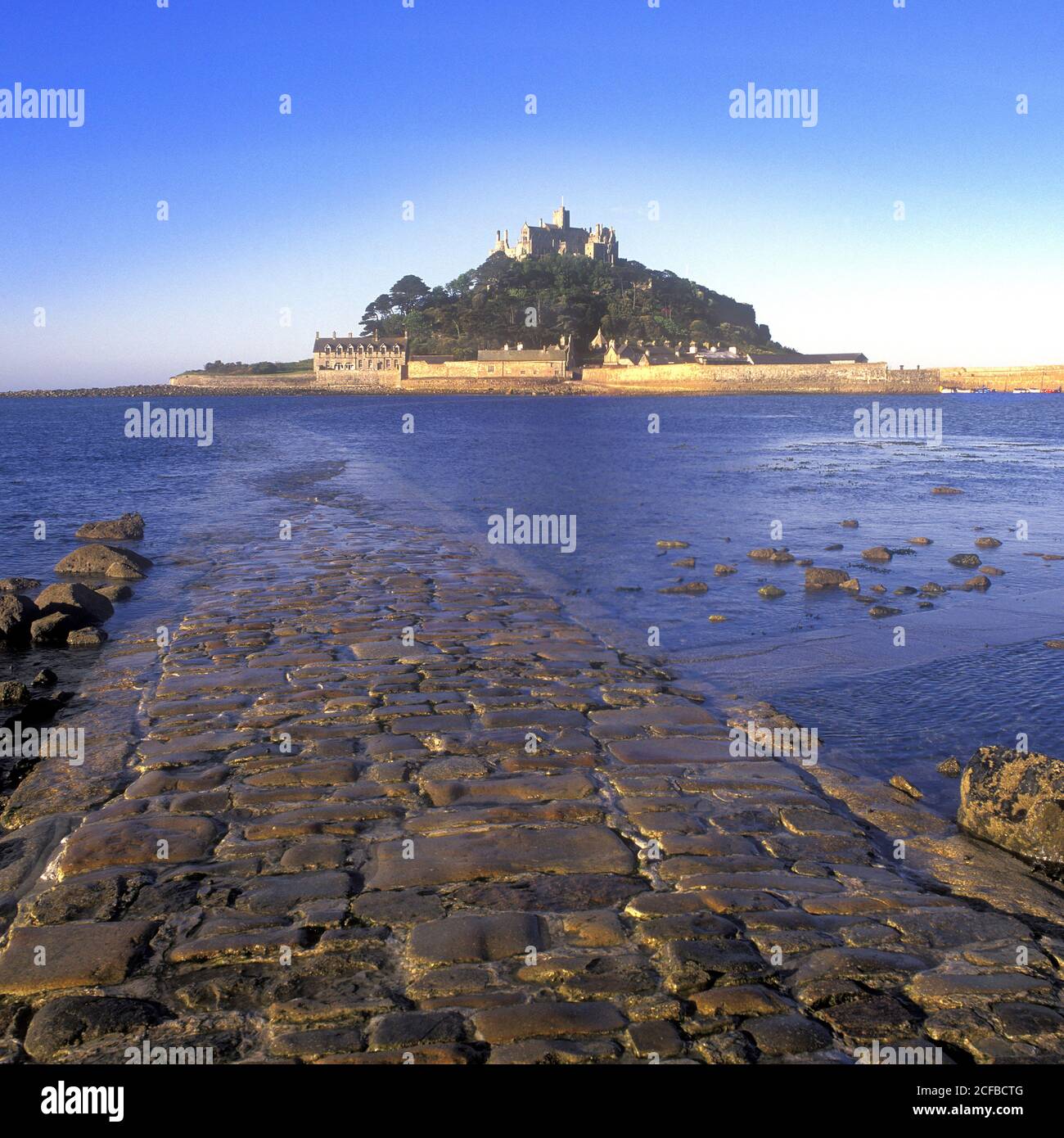 St Michaels Mount castle on a tidal island linked to mainland by man ...