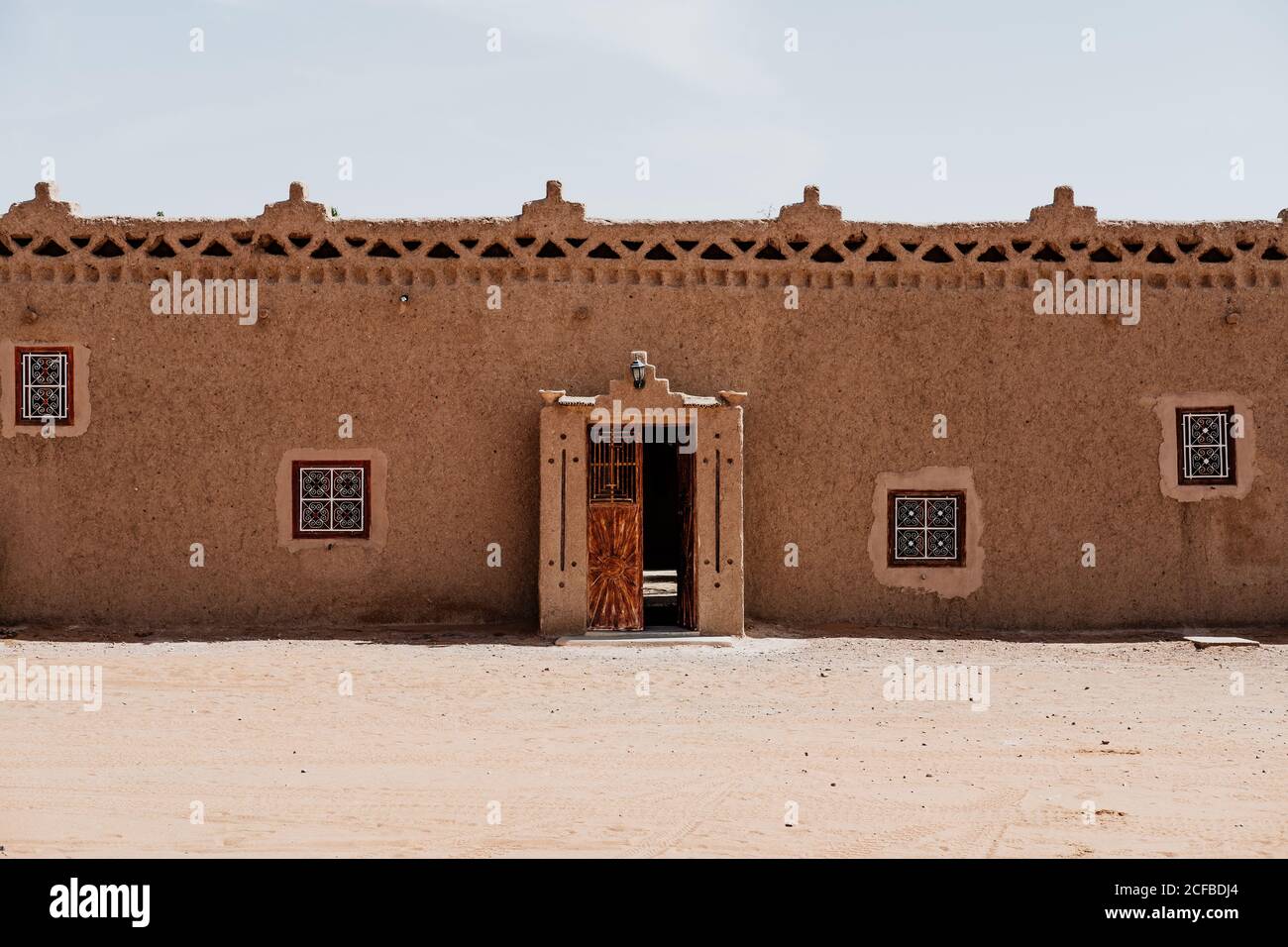 Exterior of shabby traditional Arab buildings with ornaments located on ...