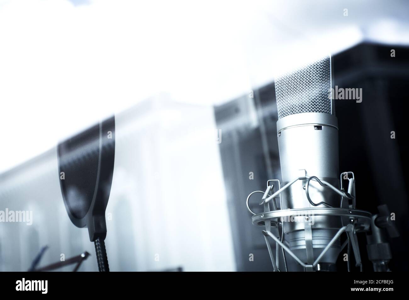 Silver professional microphone in recording hi-res stock photography ...