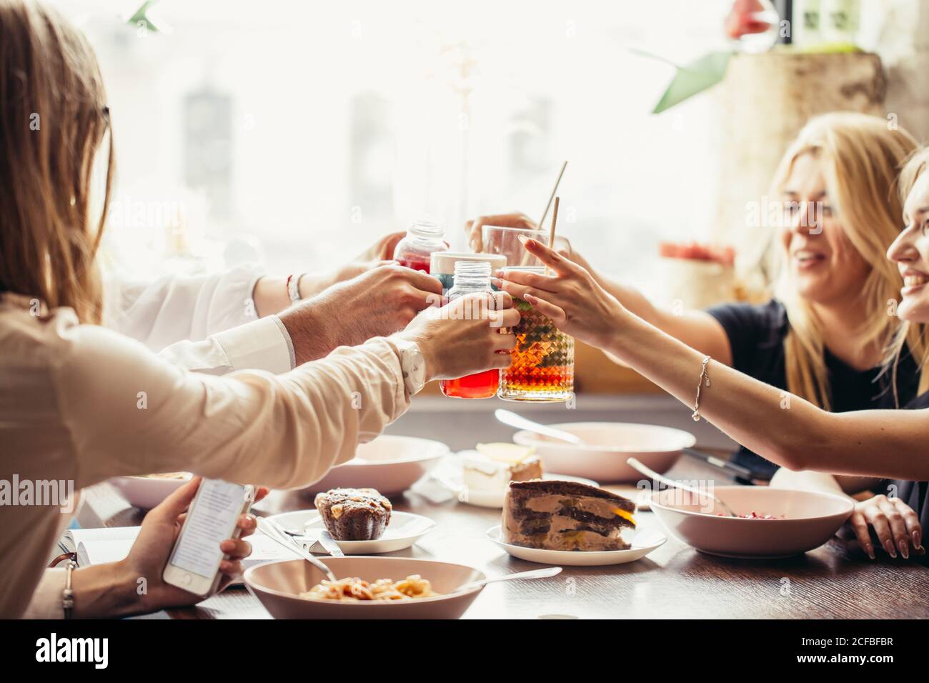 Senior team cheers hi-res stock photography and images - Alamy