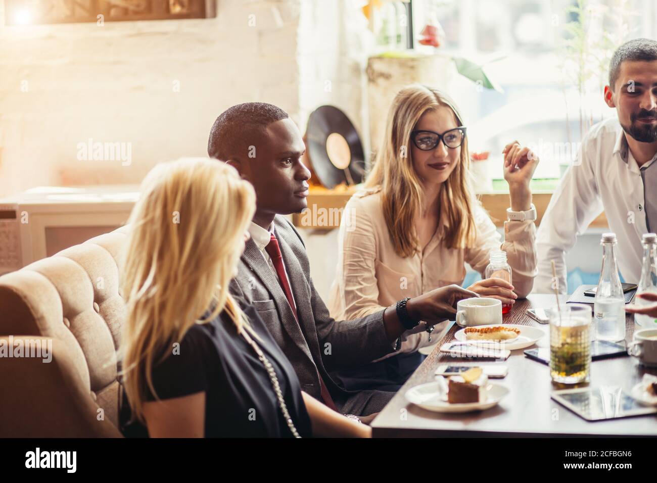 Restaurant counter food community happy hi-res stock photography and ...