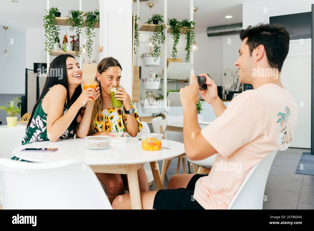 Man friends in cafeteria hi-res stock photography and images - Alamy