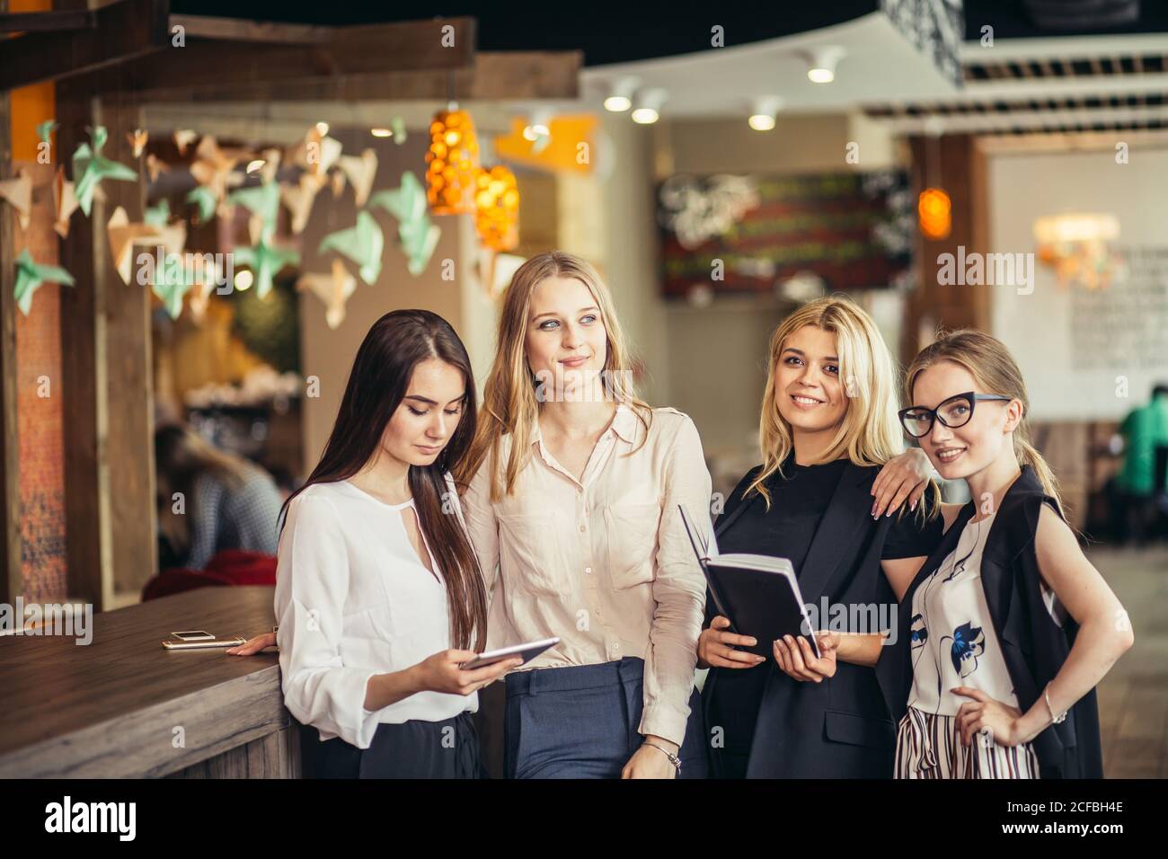Portrait Of Female Staff Standing In Modern Design Office Stock Photo ...