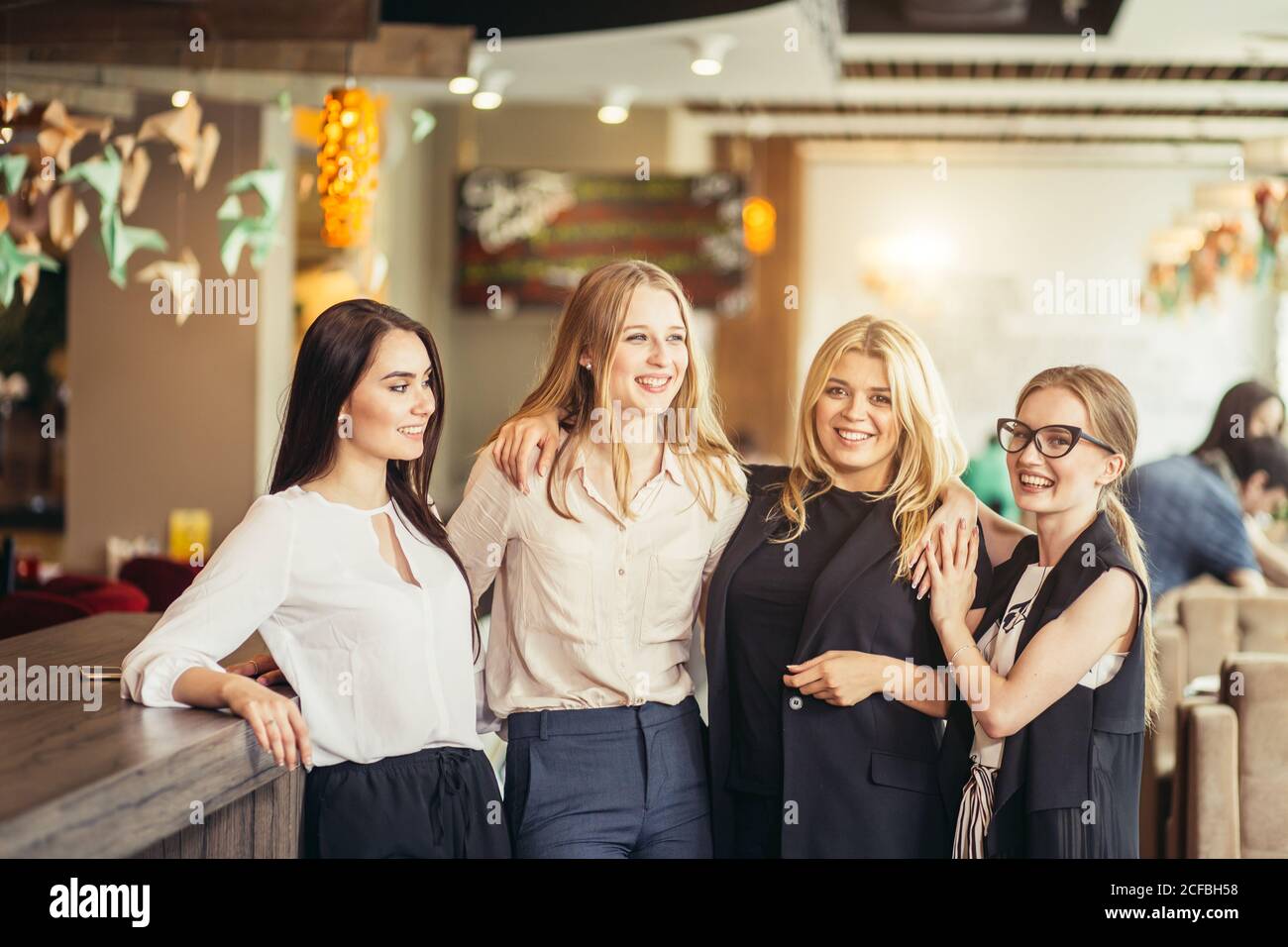 Portrait Of Female Staff Standing In Modern Design Office Stock Photo ...