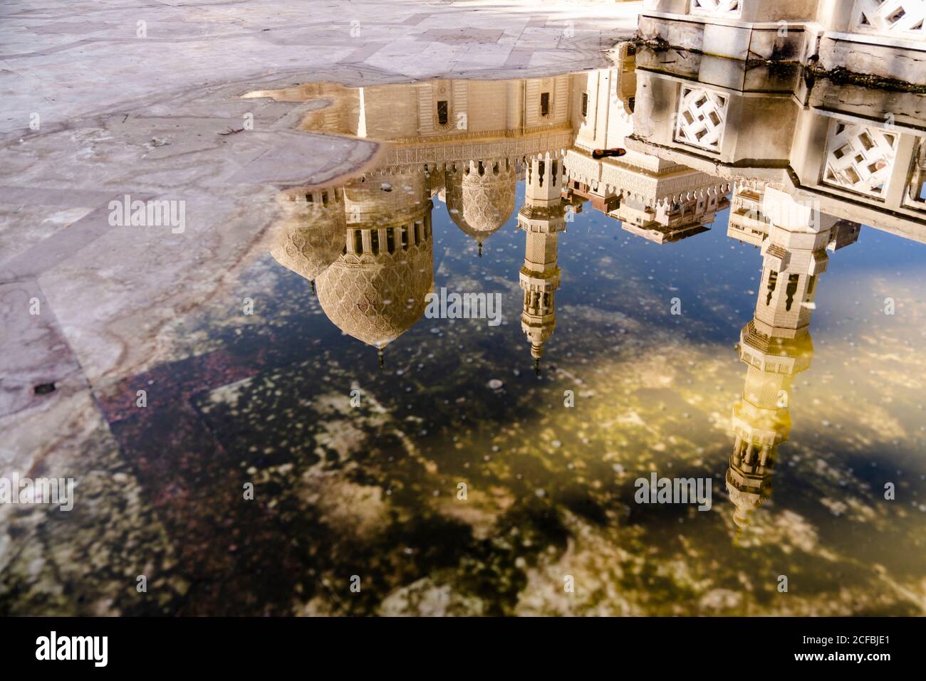 Reflection of A Mosque in a Puddle in Alexandria, Egypt Stock Photo - Alamy