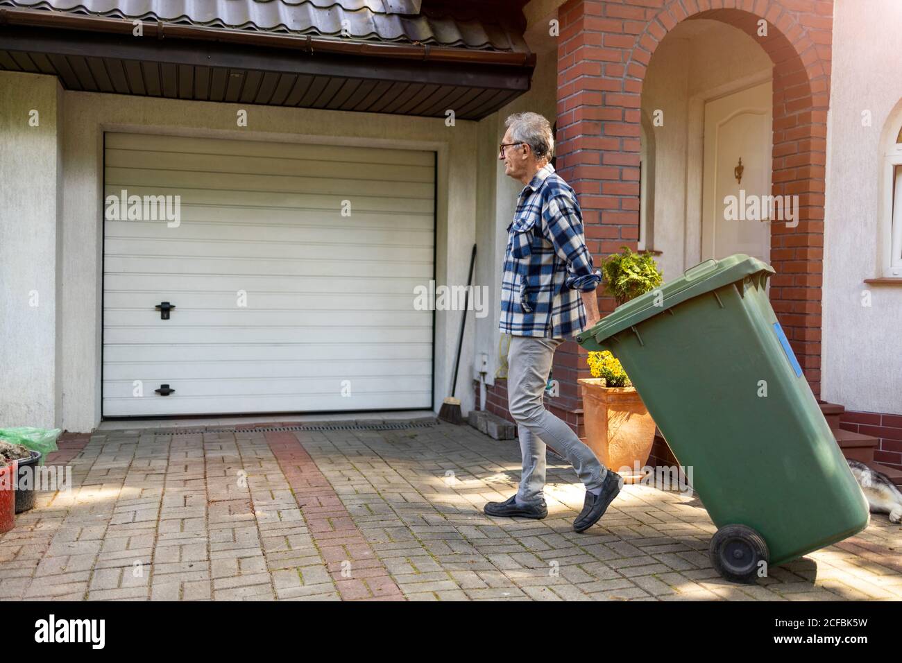 Taking out the recycling hi-res stock photography and images - Alamy