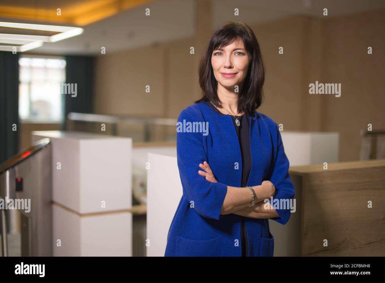 Modern smiling lawyer businesswoman stands in courthouse Stock Photo ...