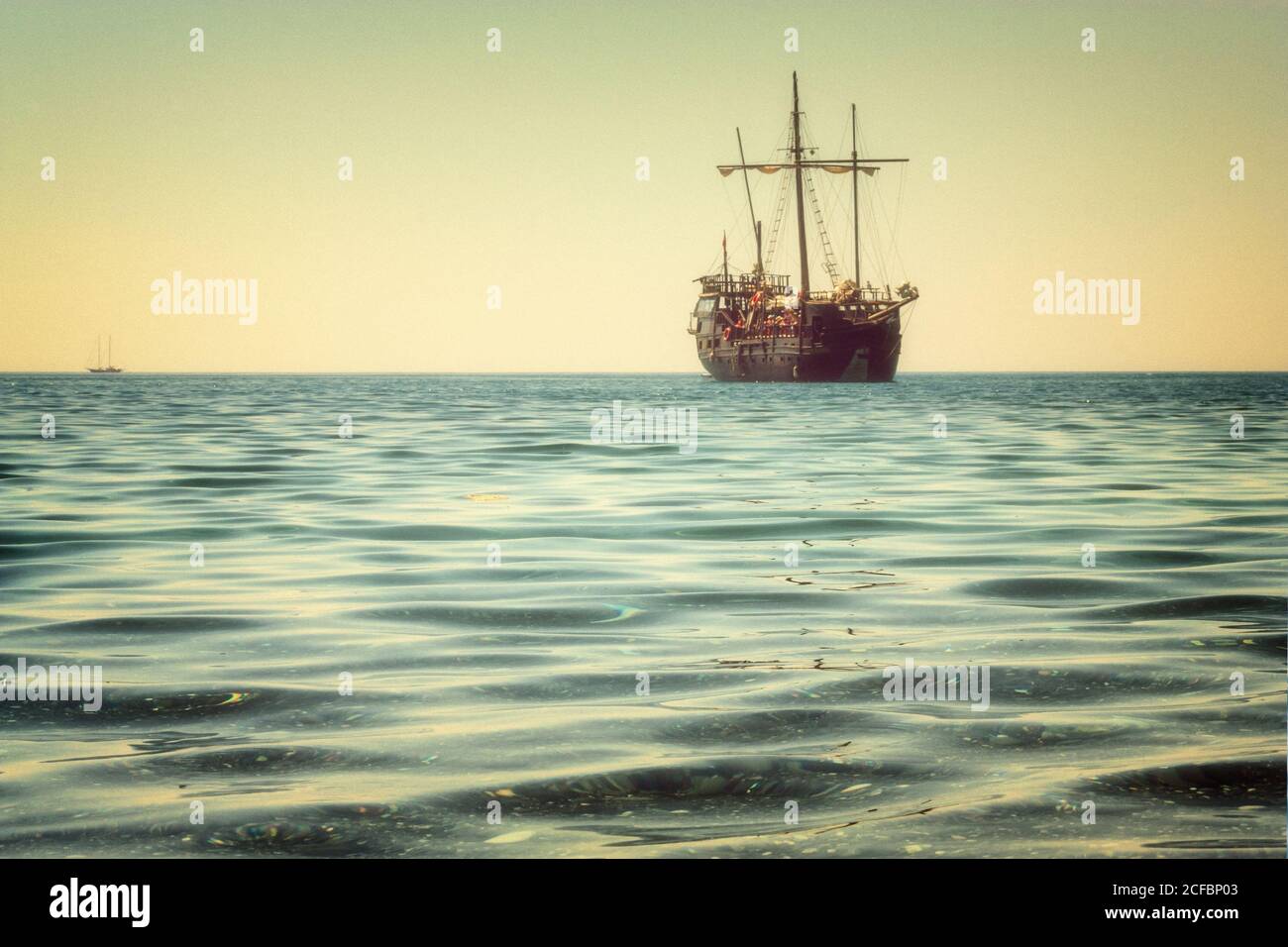 Beautiful seascape - view of morning sea with tourist sightseeing ship ...