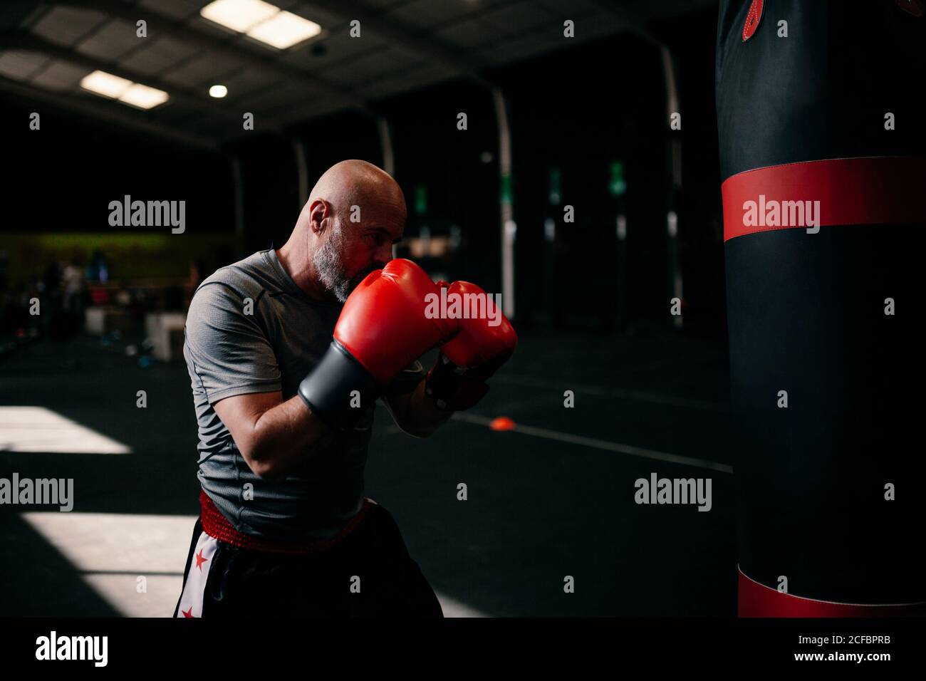 Red boxing gloves side view hi-res stock photography and images - Alamy