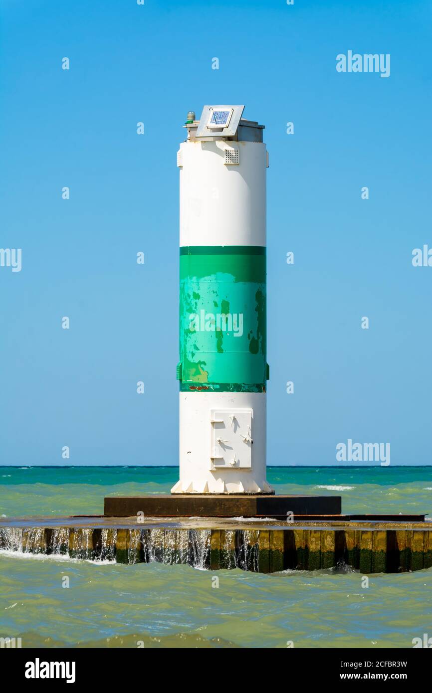 Channel marker on Lake Michigan with brilliant blue skies in the ...