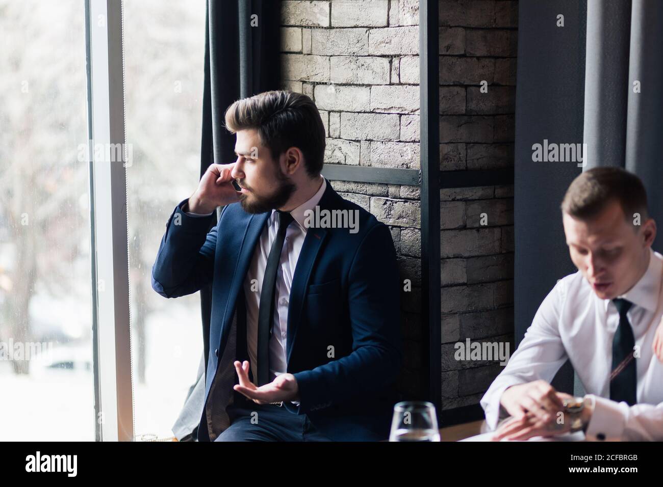 Shot of a successful businessman making call Stock Photo - Alamy