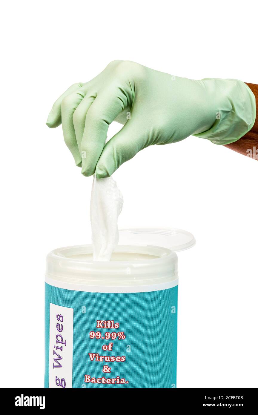 Vertical close up shot of a rubber gloved hand pulling up on a ...