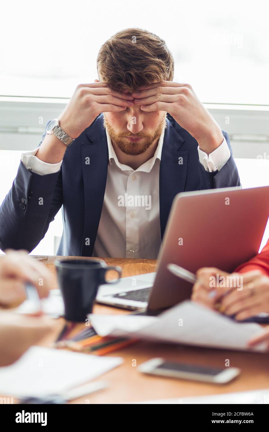tired Thinking business man Stock Photo - Alamy