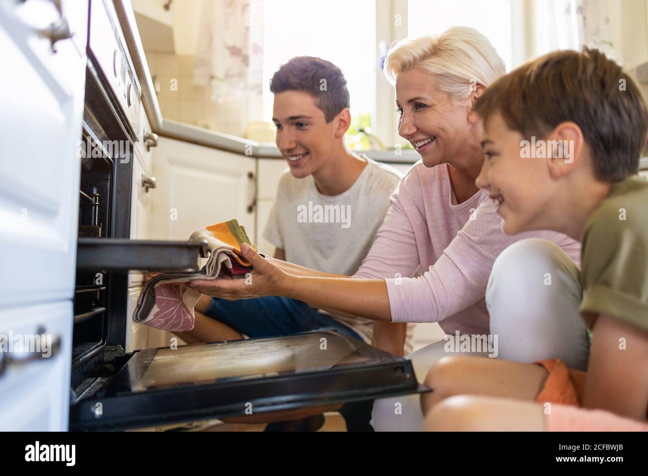 Mother teaching kids hi-res stock photography and images - Alamy