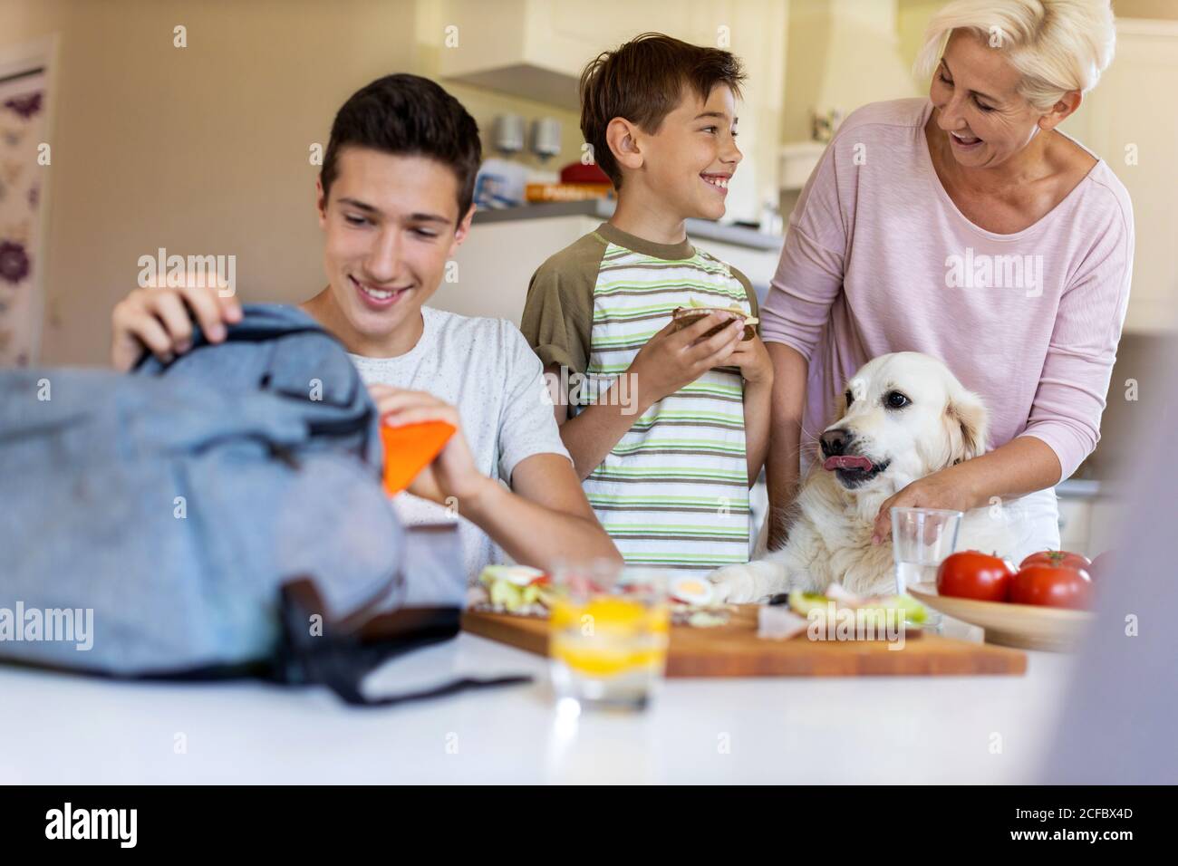 Mother helping son ready school hi-res stock photography and images - Alamy