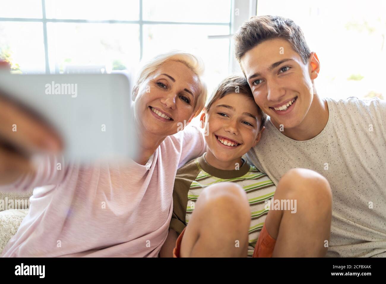 Single parent family with two sons hi-res stock photography and images ...