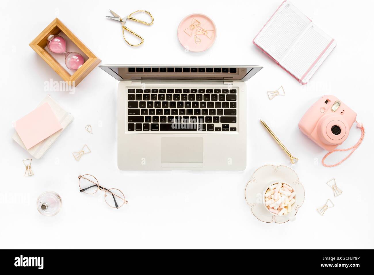 Stylized women's home office desk. Workspace with laptop, computer ...
