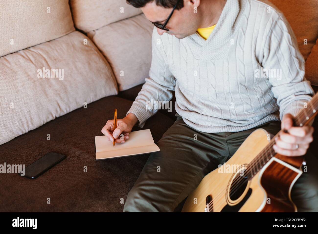 Writing music in a notebook hi-res stock photography and images - Alamy
