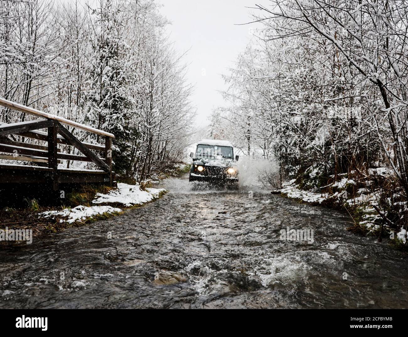 Black car drives through hi-res stock photography and images - Alamy