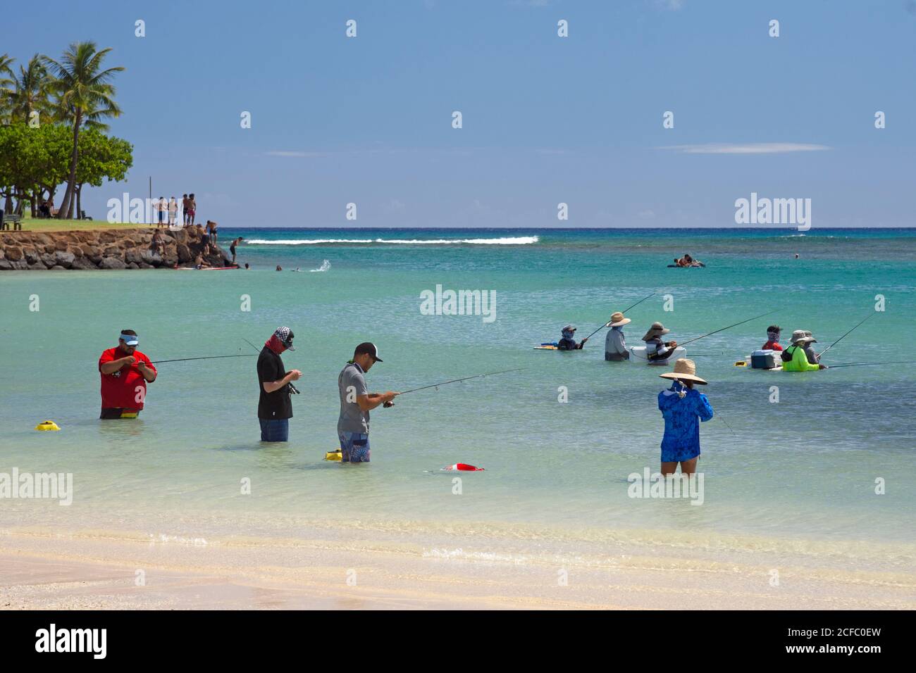 Summer fishing at Ala Moana Beach, Honolulu, Oahu, Hawaii, USA Stock ...