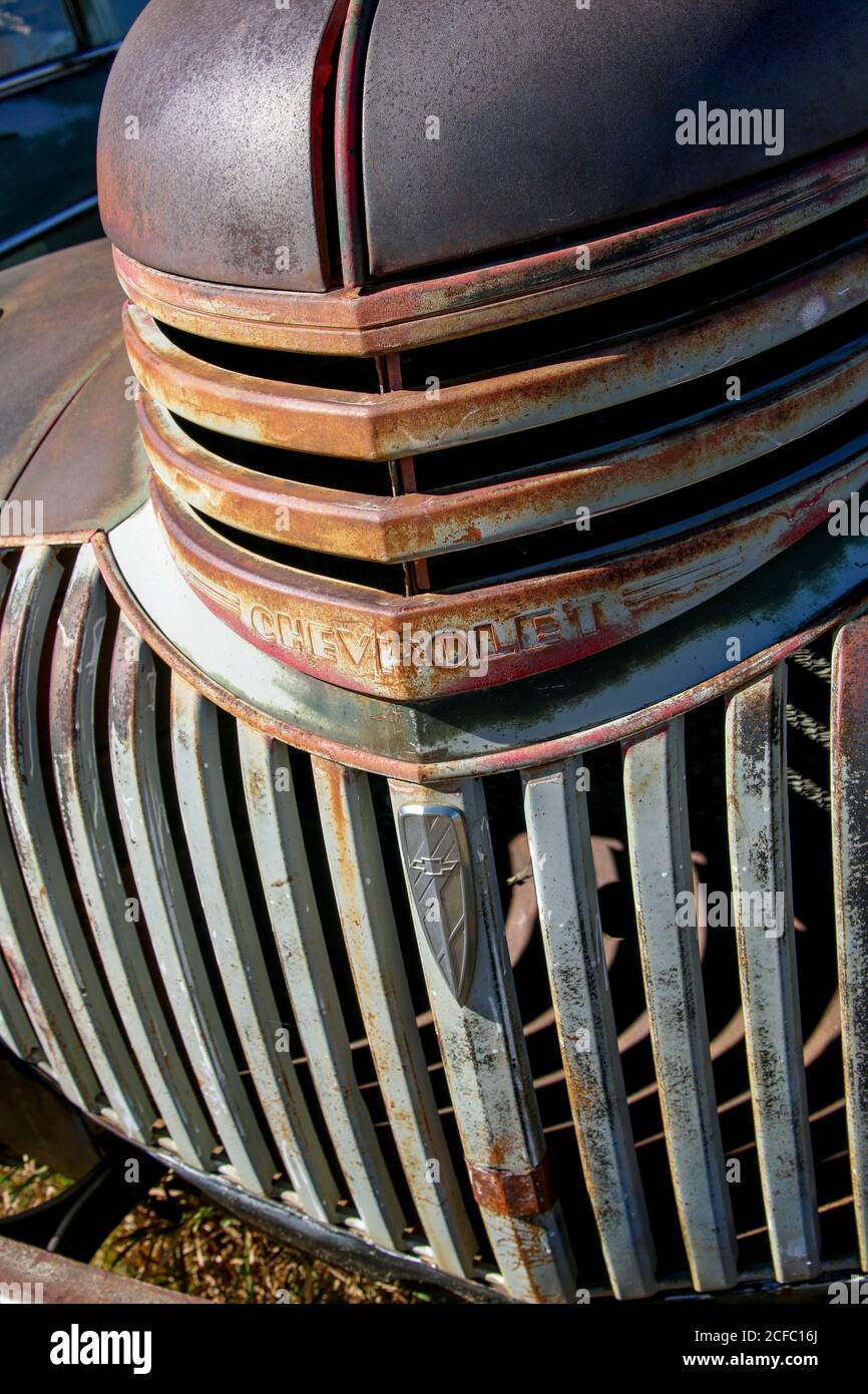 Rusted car wrecks Hot Rods in USA Buick Packard details Stock Photo - Alamy