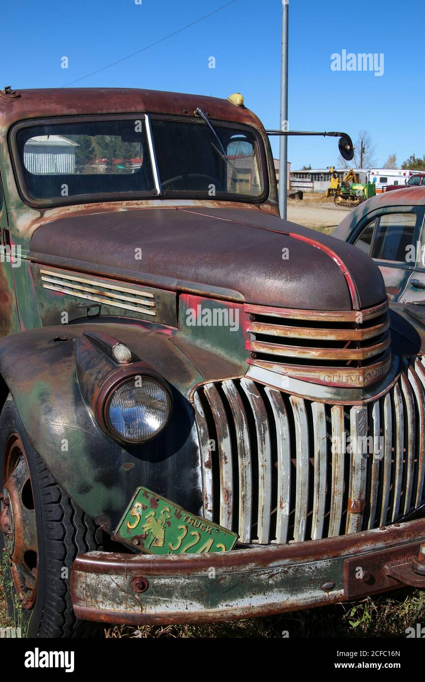 Rusted car wrecks Hot Rods in USA Buick Packard details Stock Photo - Alamy