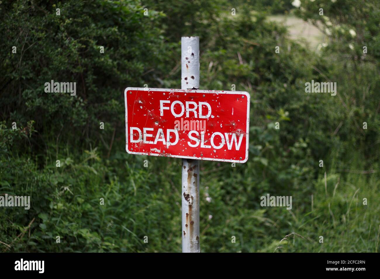 Dead slow sign hi-res stock photography and images - Alamy