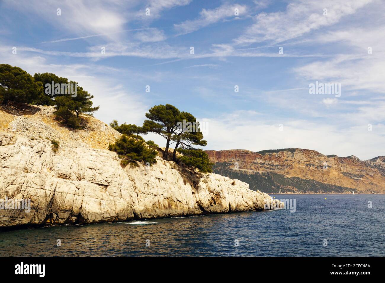Mountain landscape with white rocks and trees Stock Photo - Alamy
