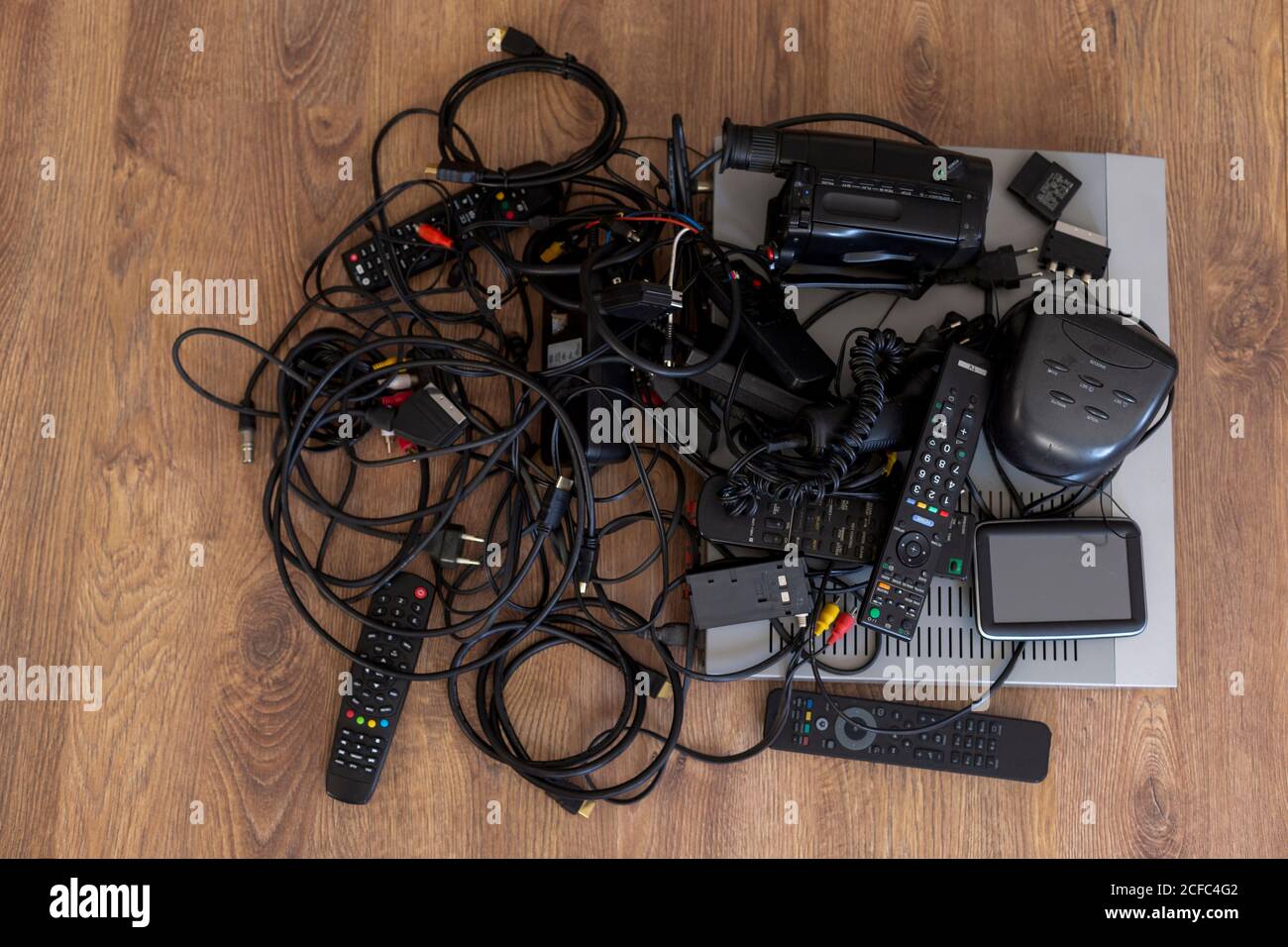 Electronic trash accumulated at home and recycling Stock Photo - Alamy
