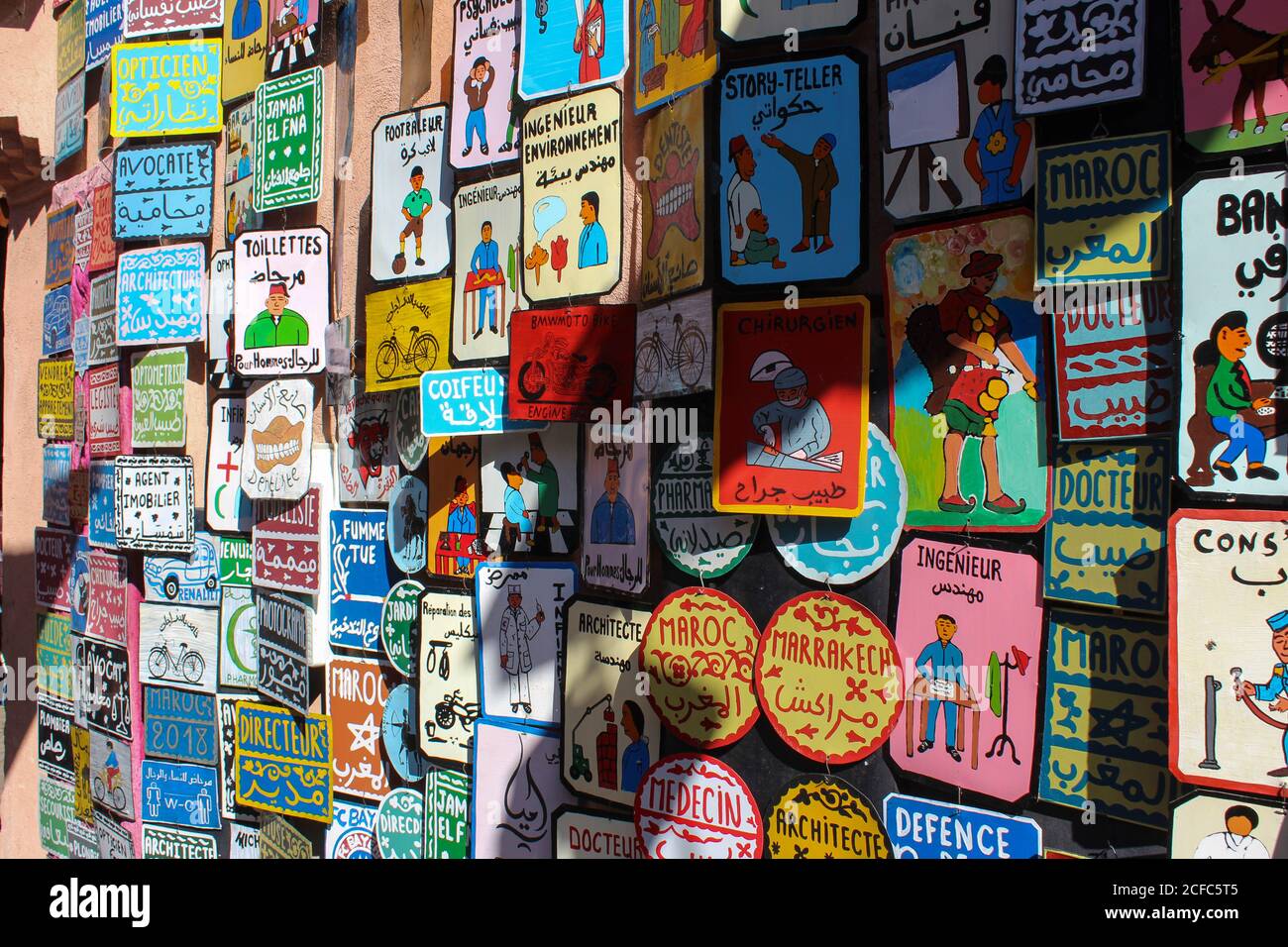 Signs for sale in the souk of Marrakech, Morocco Stock Photo - Alamy