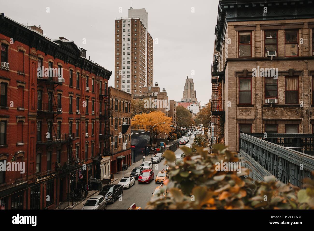 Street with red buildings Stock Photo - Alamy