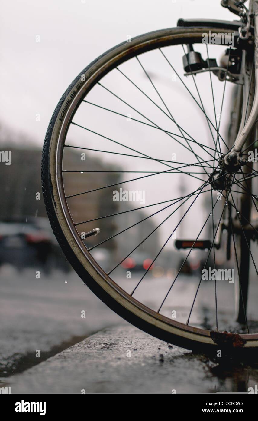 Wet sidewalk bicycle hi-res stock photography and images - Alamy