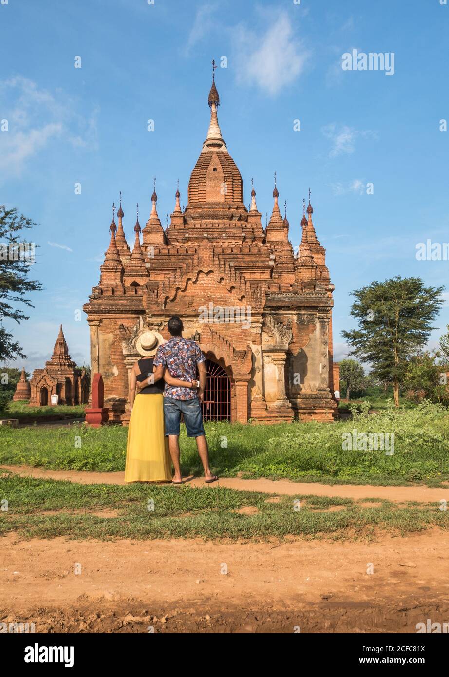Romantic couple standing in front of old temple Stock Photo - Alamy