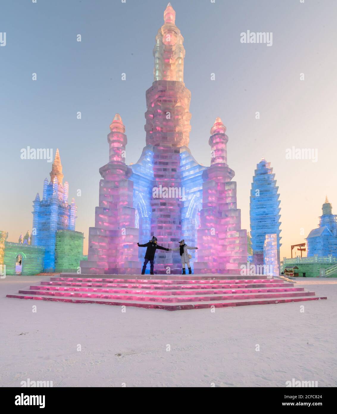 Side view of unrecognizable man and Woman in warm outwear dancing while ...