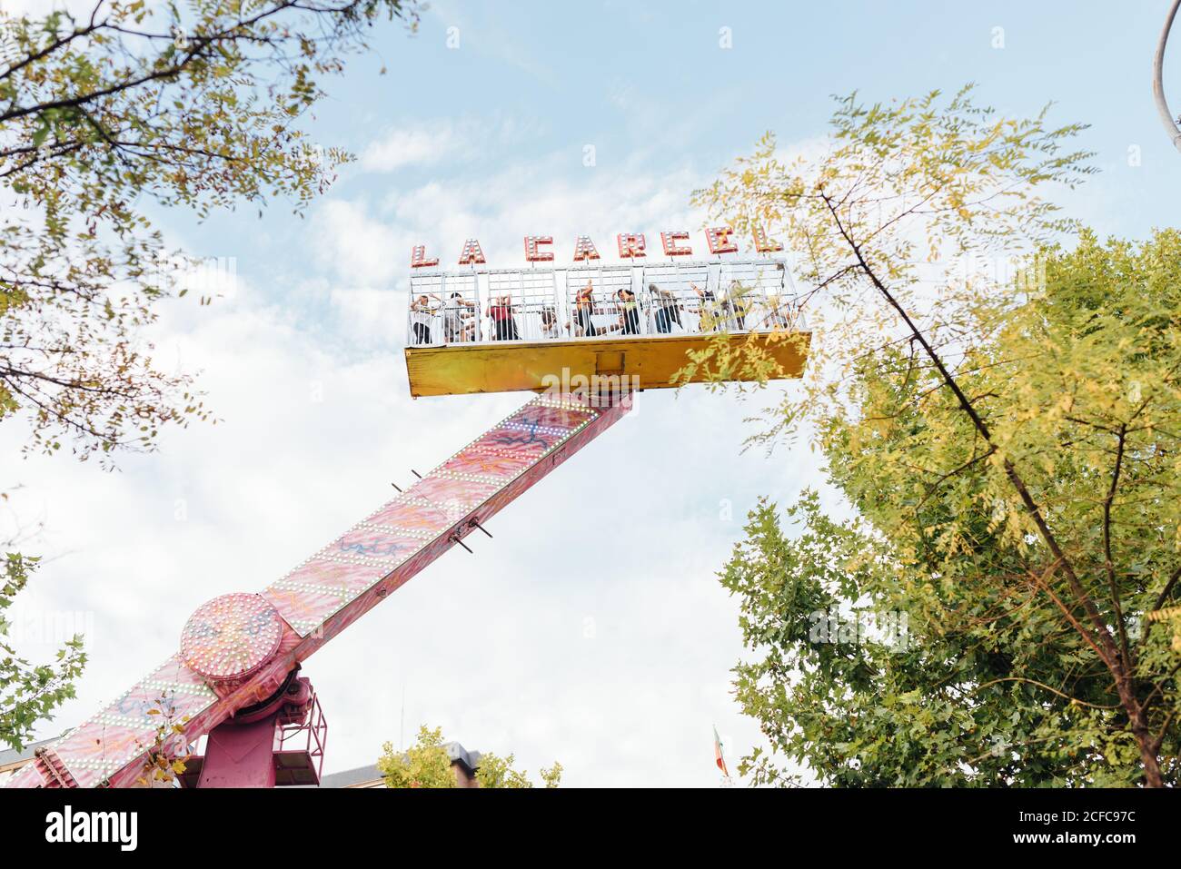Amusement ride amidst trees in park Stock Photo - Alamy