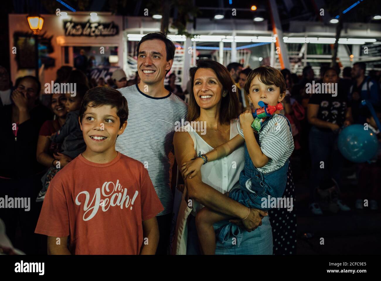 Smiling cheerful glad family hi-res stock photography and images - Alamy