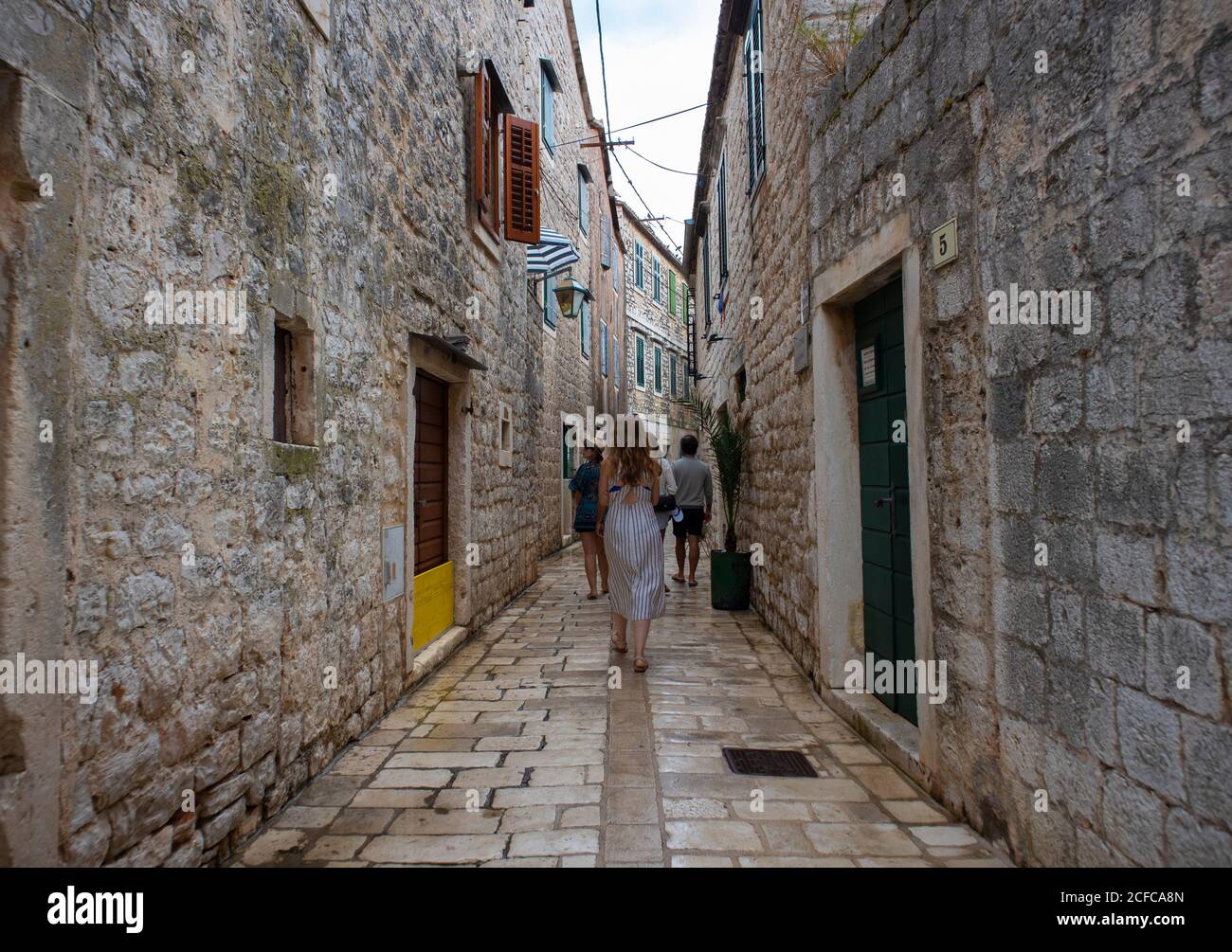 Stari grad/Croatia-August 5th,2020: Small group of tourists walking ...