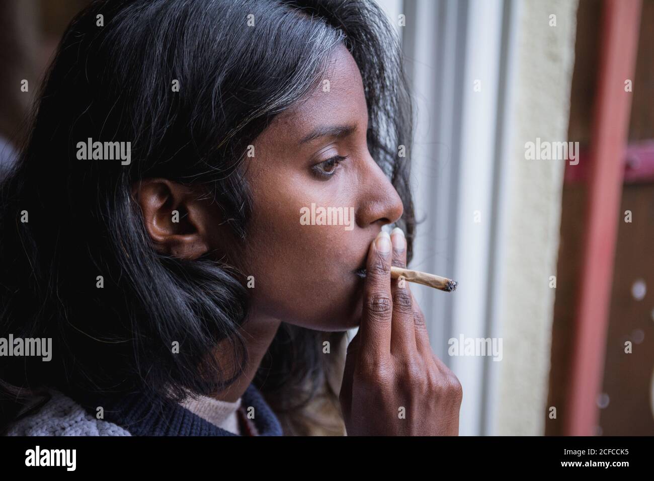 Indian woman smoker hi-res stock photography and images - Alamy