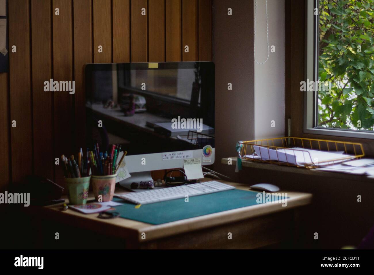 Interior of comfortable workplace with modern personal computer near ...