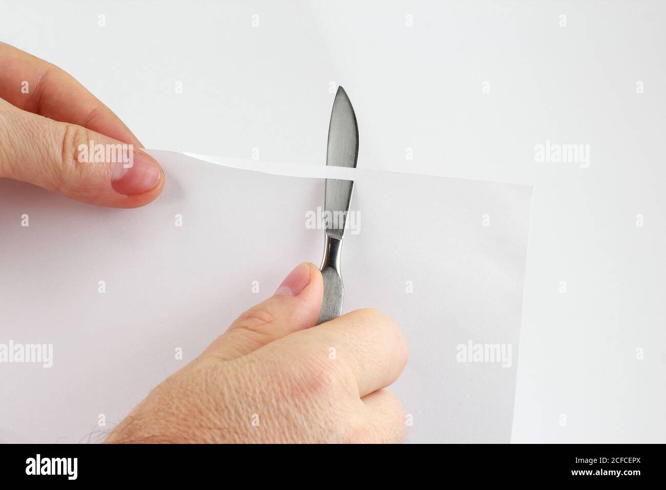 Scalpel paper hi-res stock photography and images - Alamy