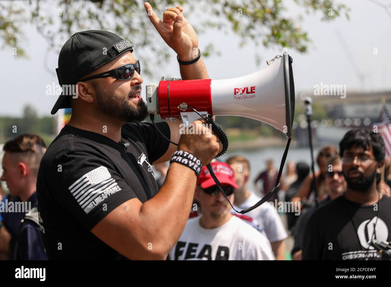 Patriot Prayer founder Joey Gibson addresses his supporters at a "Free ...