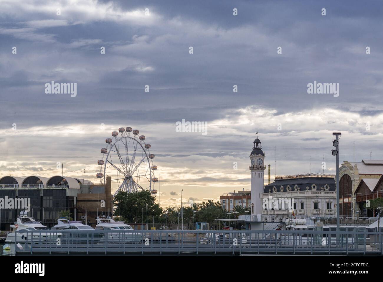 Night sunset view Port Authority buildings with clock tower in Valencia ...