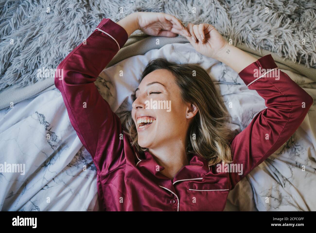 Young woman sleeping bed from above hi-res stock photography and images ...